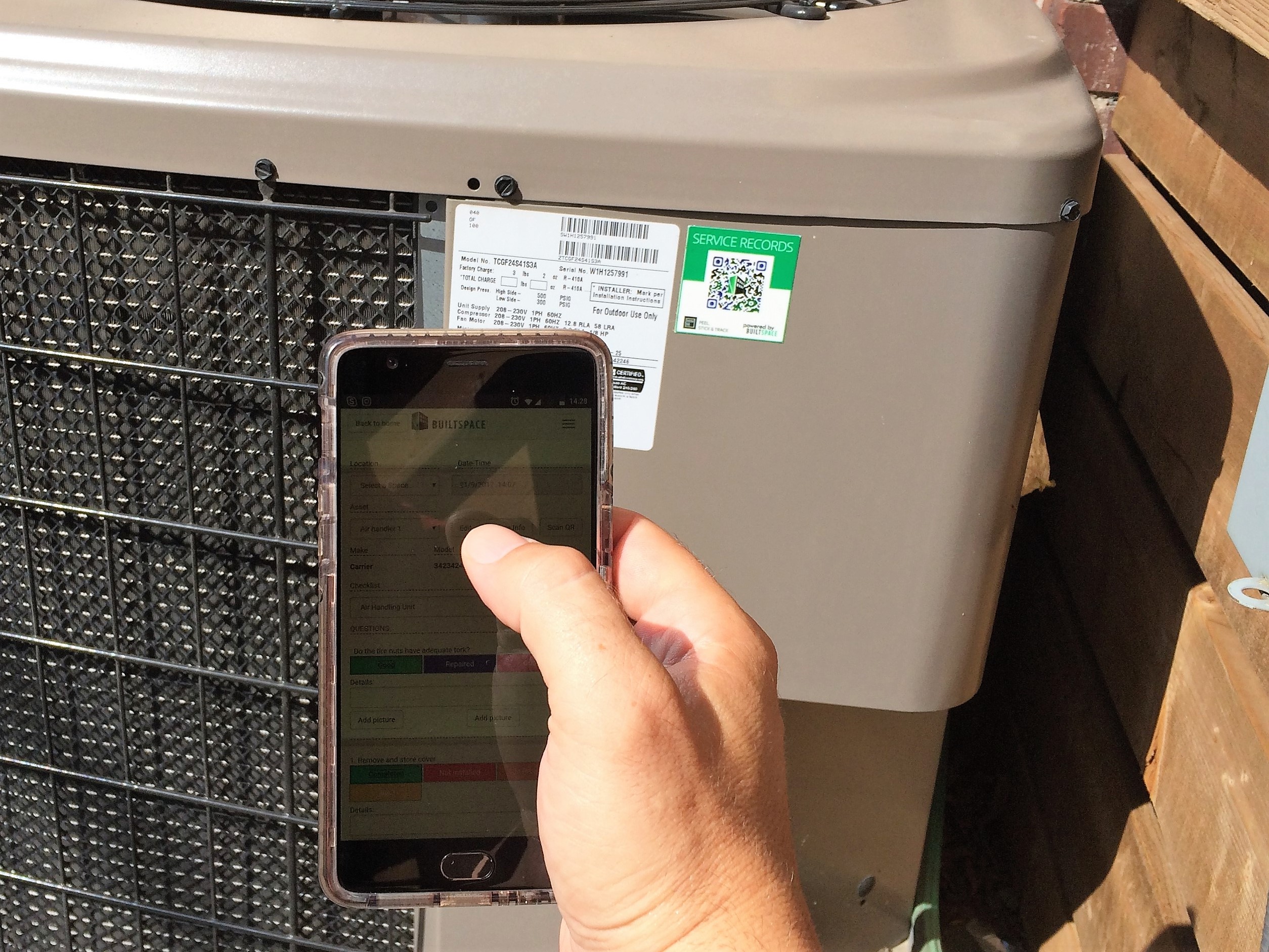 ian scanning QR code on his aircon – BuiltSpace – Digital Twins for ...